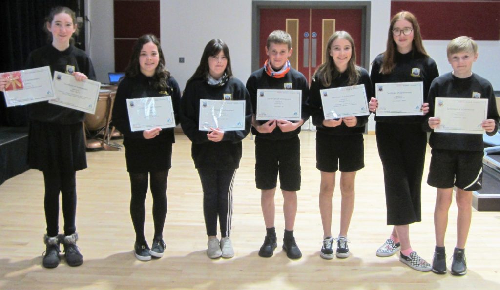 Pupils receive their achievement awards - Arran Banner