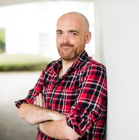 Wrestling superstar thanks local author for helping to save a child's ...