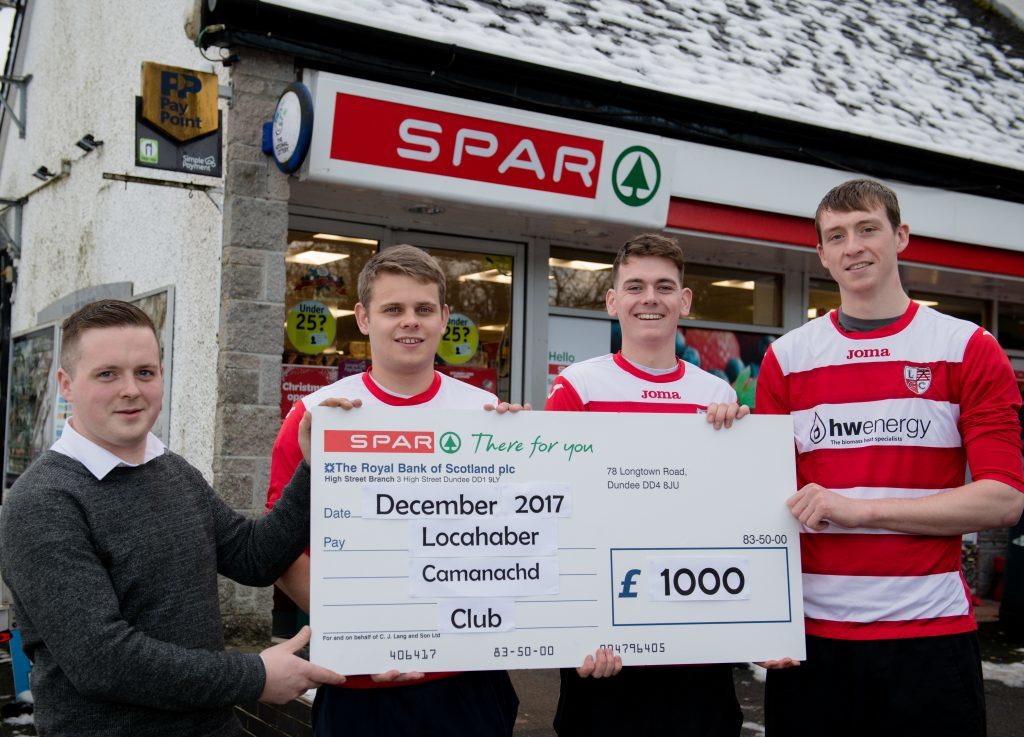 Spean Bridge Spar shop's £1,000 cheque to shinty club - The Oban Times