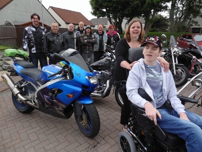 Severely disabled teen's biker dream comes true