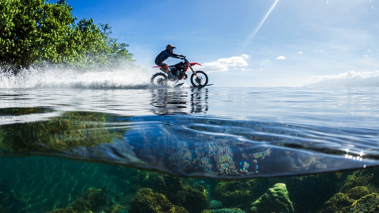 Just a motorcycle driving on the ocean nothing to see here