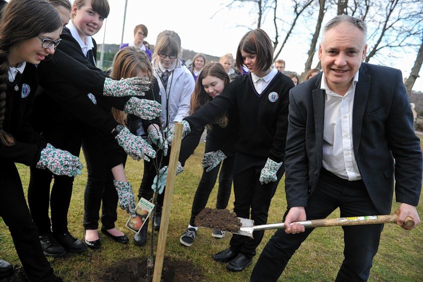 Pupils plant apple tree to mark Moray school's 40th year - Press and ...