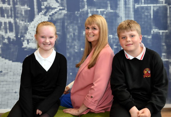 Camilla experiences the fast pace of journalism with visit to The P&J ...