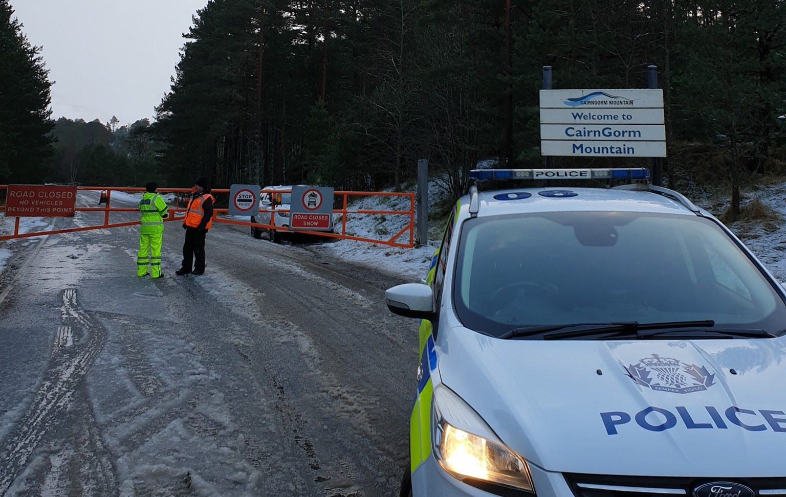 Snow gates closed and motorists face 'challenging' wintry conditions in ...