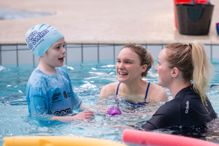 More children with disabilities learning to swim through inclusion ...