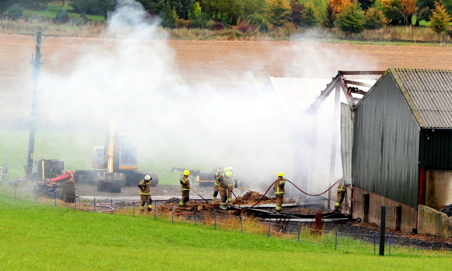 Fire crews tackle farm building blaze near north-east village