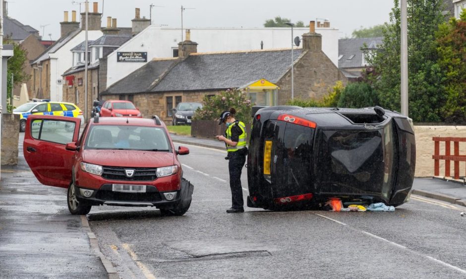 Woman taken to hospital after car overturns in Elgin - Press and Journal