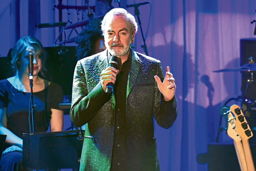 Few acts can ever sparkle as bright as legendary singer Neil Diamond ...