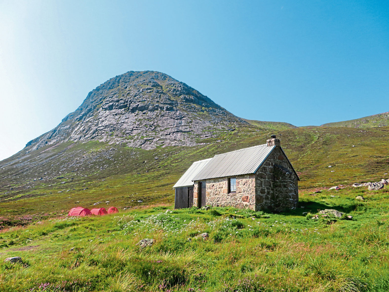 Walkers celebrate famous bothy after 100 years of saving lives in Scots ...