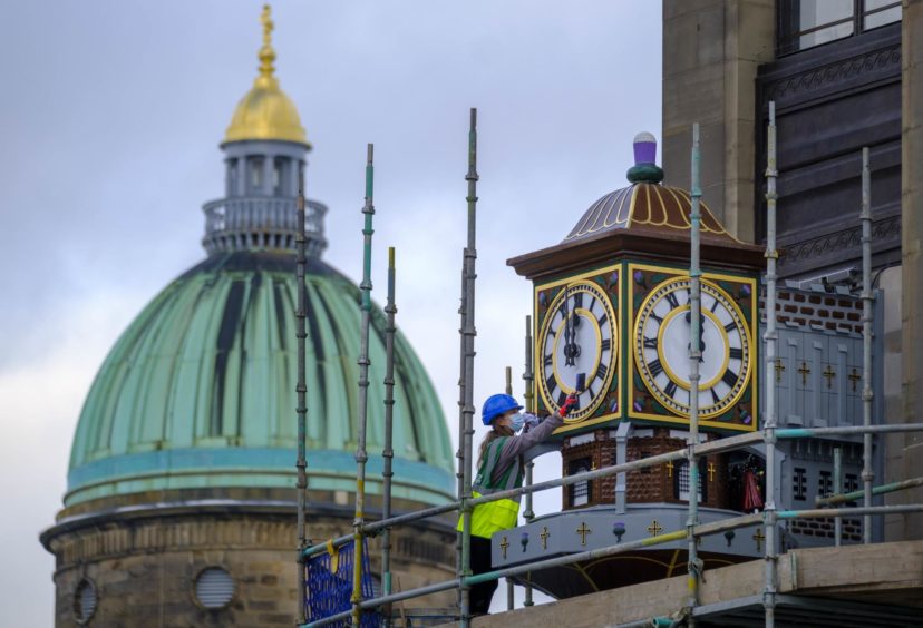 Restoration work on Edinburgh's Binns Clock is completed in time for ...
