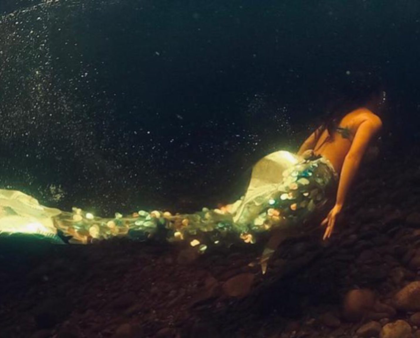 Wild swimming mermaid dives deep in Highland lochs after making her own ...