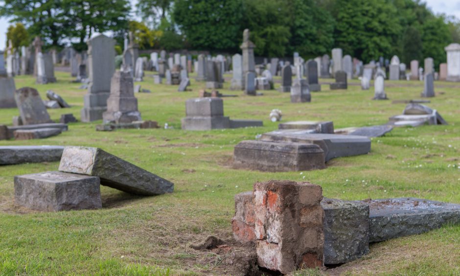 Boy, 15, charged over Leslie Cemetery vandalism - The Courier