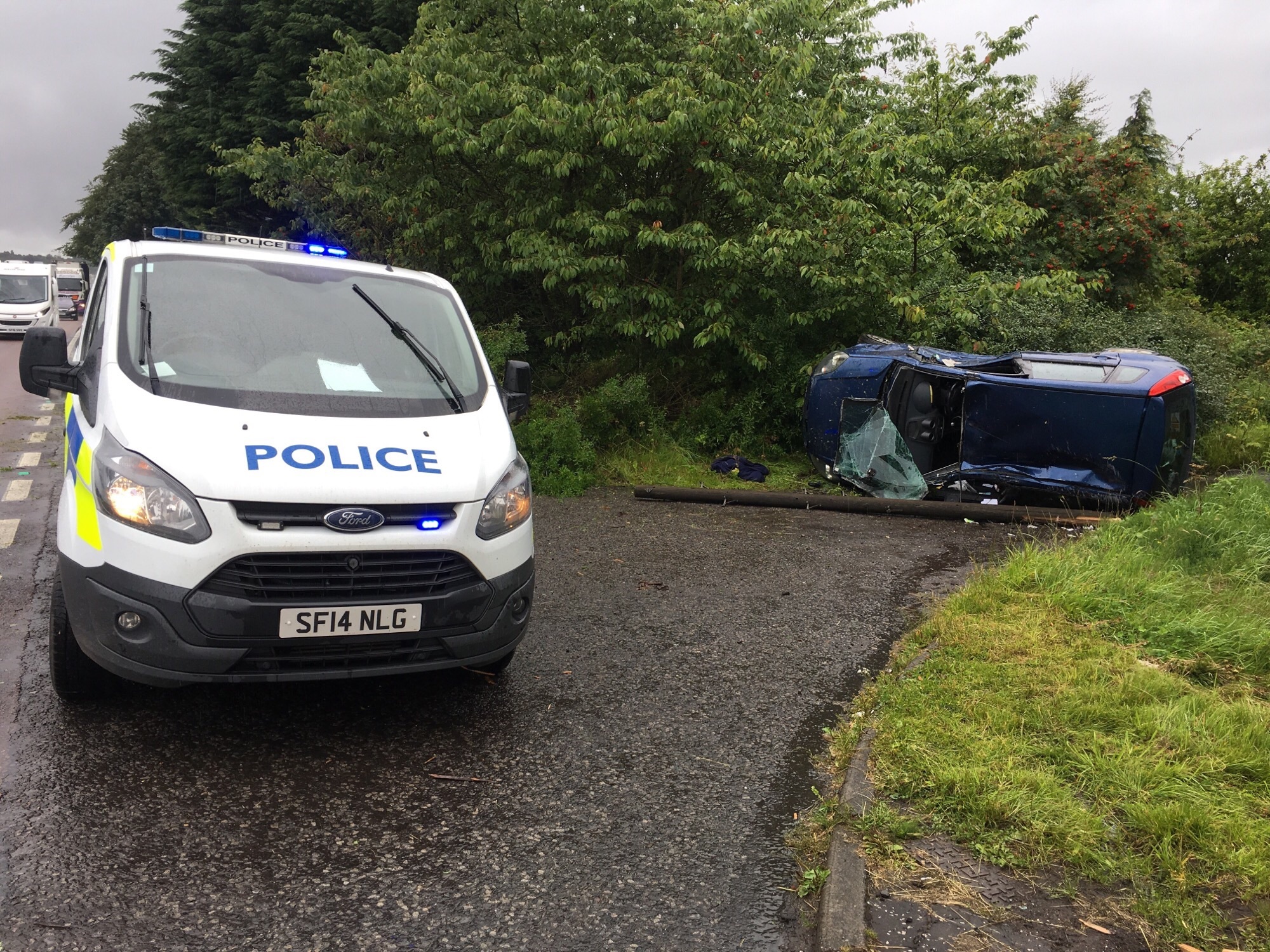 Car careers off road and strikes a pole near Perth's Broxden roundabout ...