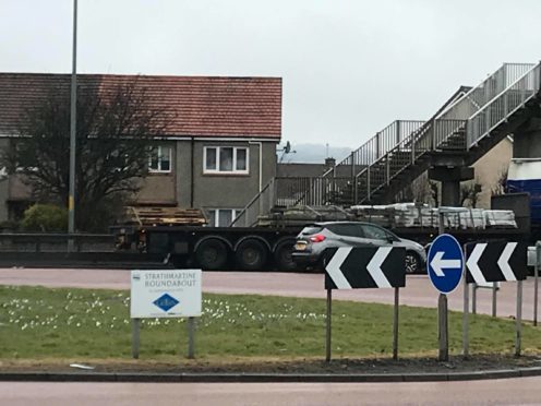 Police called after bricks scattered across busy Dundee roundabout as ...