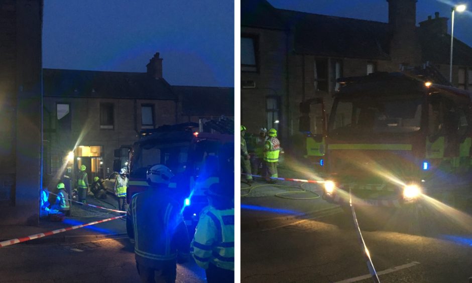 VIDEO: Woman treated at scene as flat blaze hits Forfar town centre ...