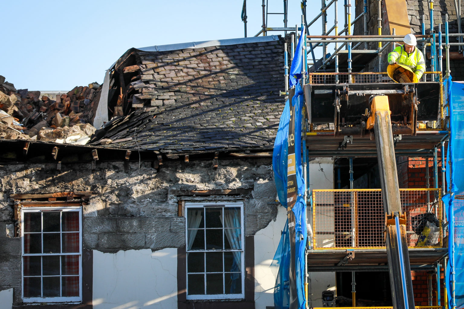 VIDEO: Workers dismantle parts of building which collapsed into Perth ...