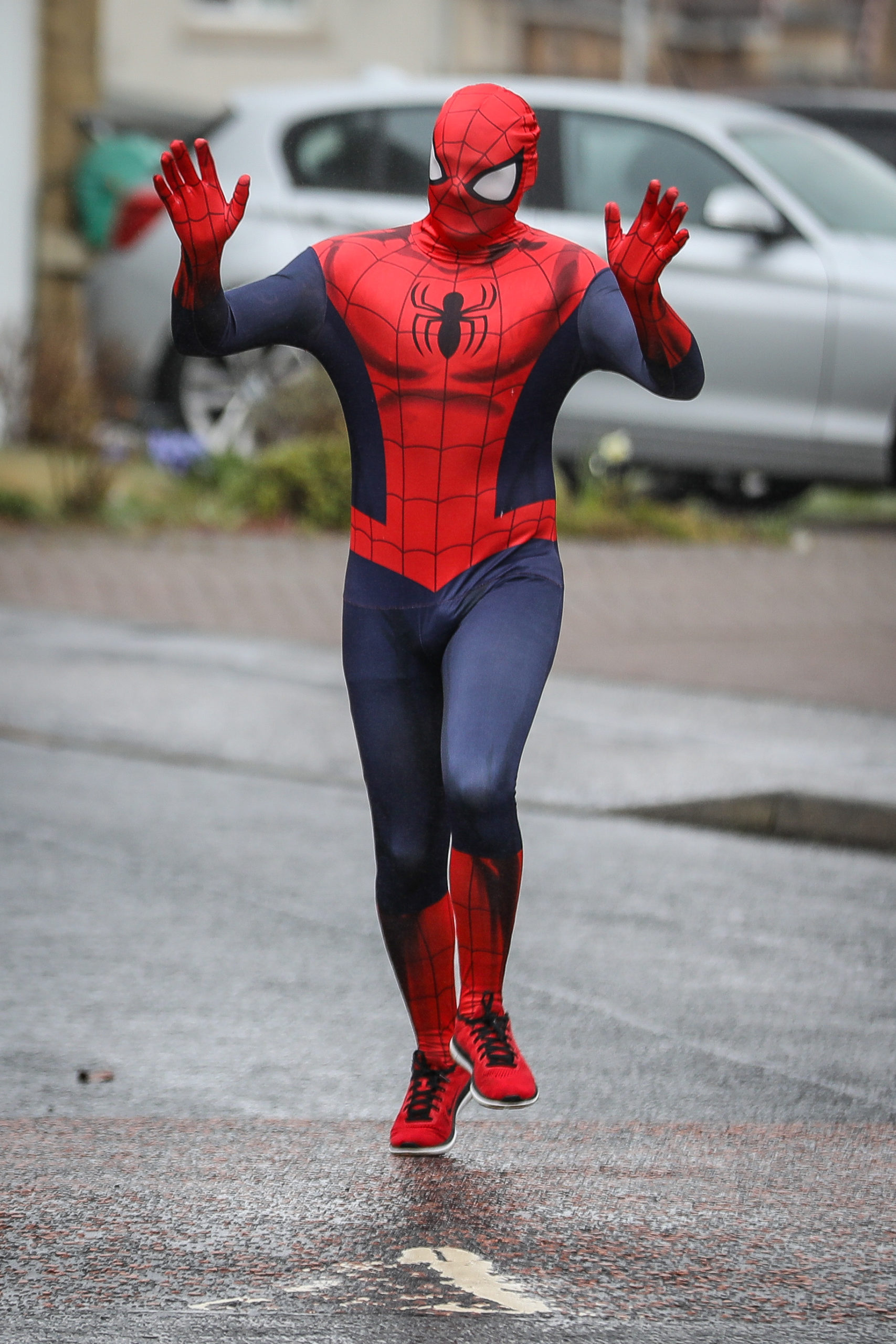 The Amazing Spider-Man spreads cheer on his daily run through ...