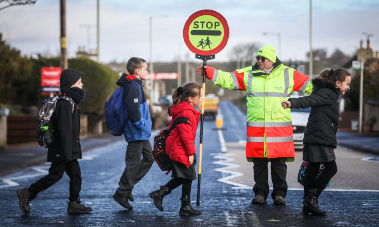 Parents launch eleventh-hour petition to save Balbeggie lollipop lady ...