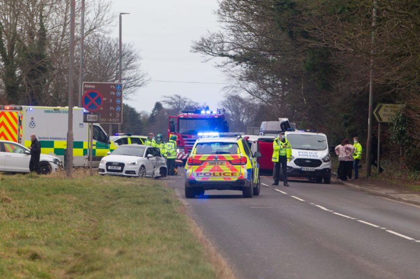 Motorist cut free from three-car Angus road accident