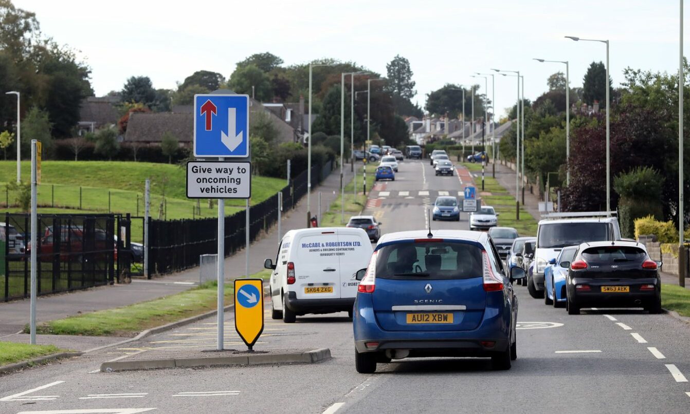 A sign mess: Confusion at wrong traffic signals outside Dundee school
