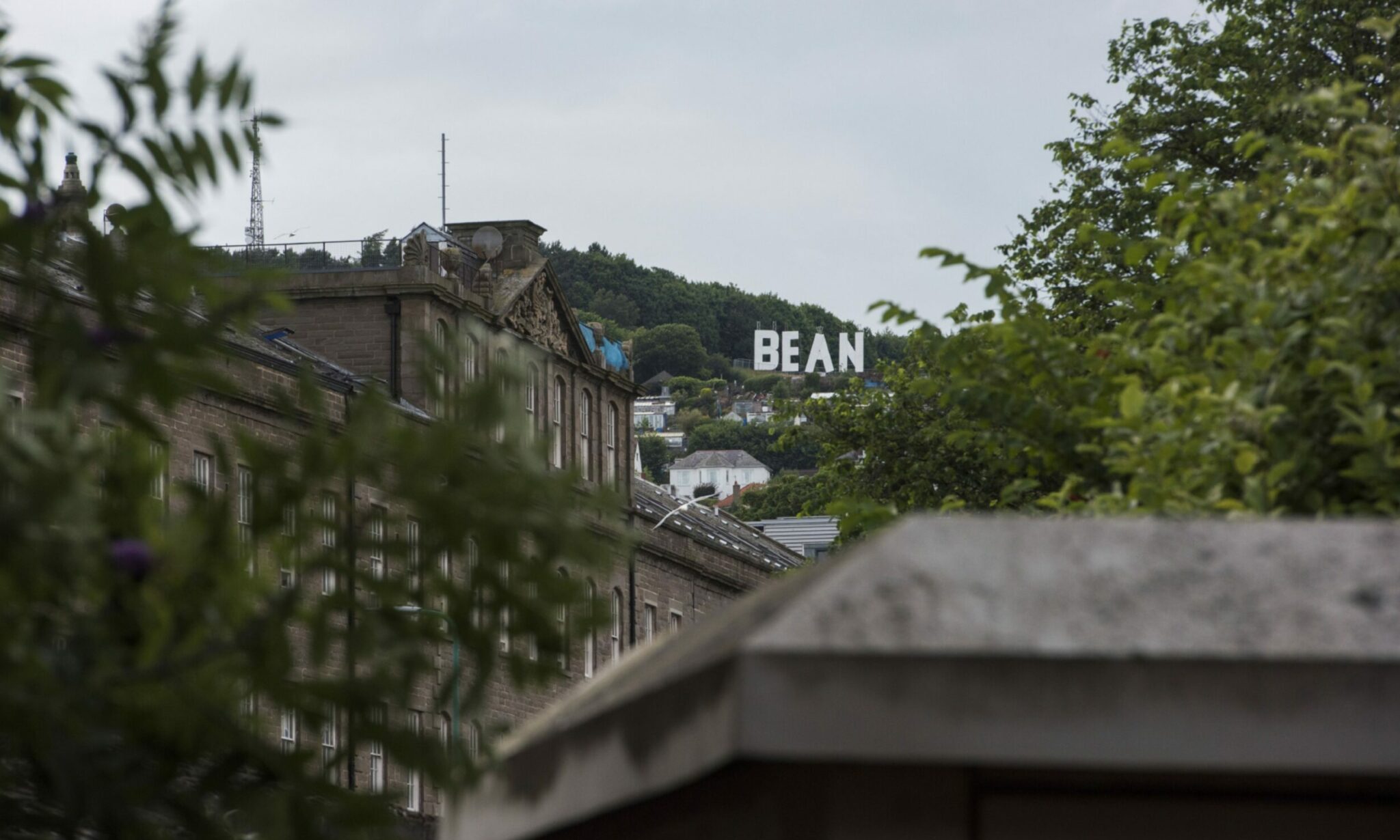 Why is there a huge BEAN sign on Dundee Law? - The Courier