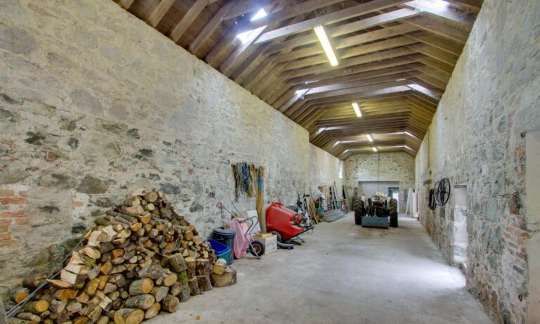 Converted stable in rural Angus has beautiful clock tower