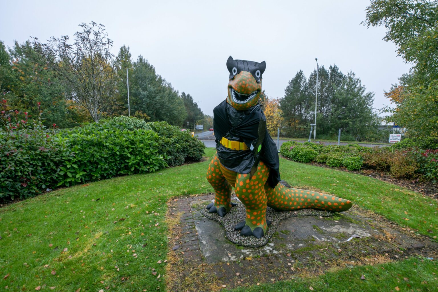 Rexie the Glenrothes dinosaur mysteriously dressed as Batman