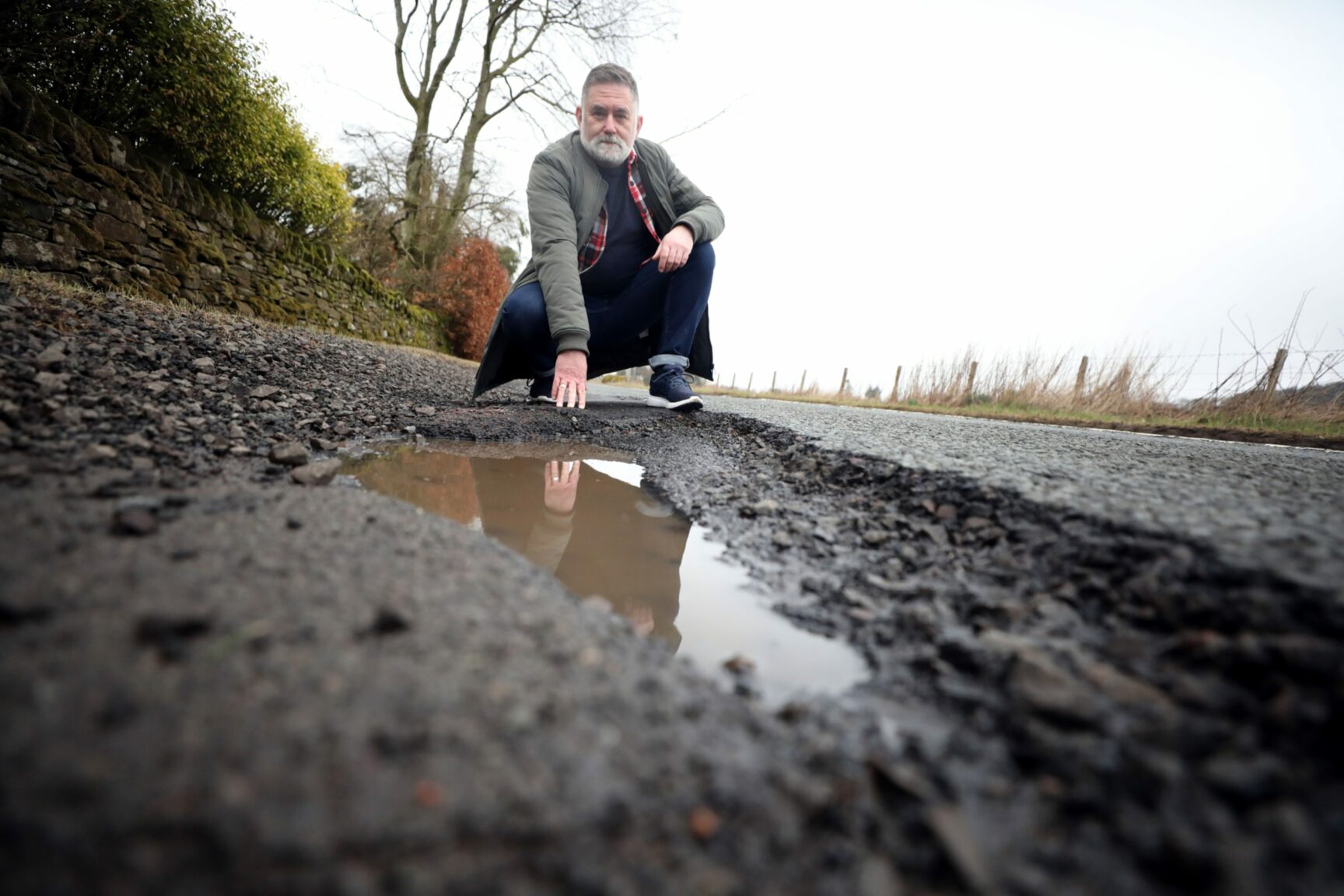 Angus driver forced to replace two tyres after hitting 7ft pothole