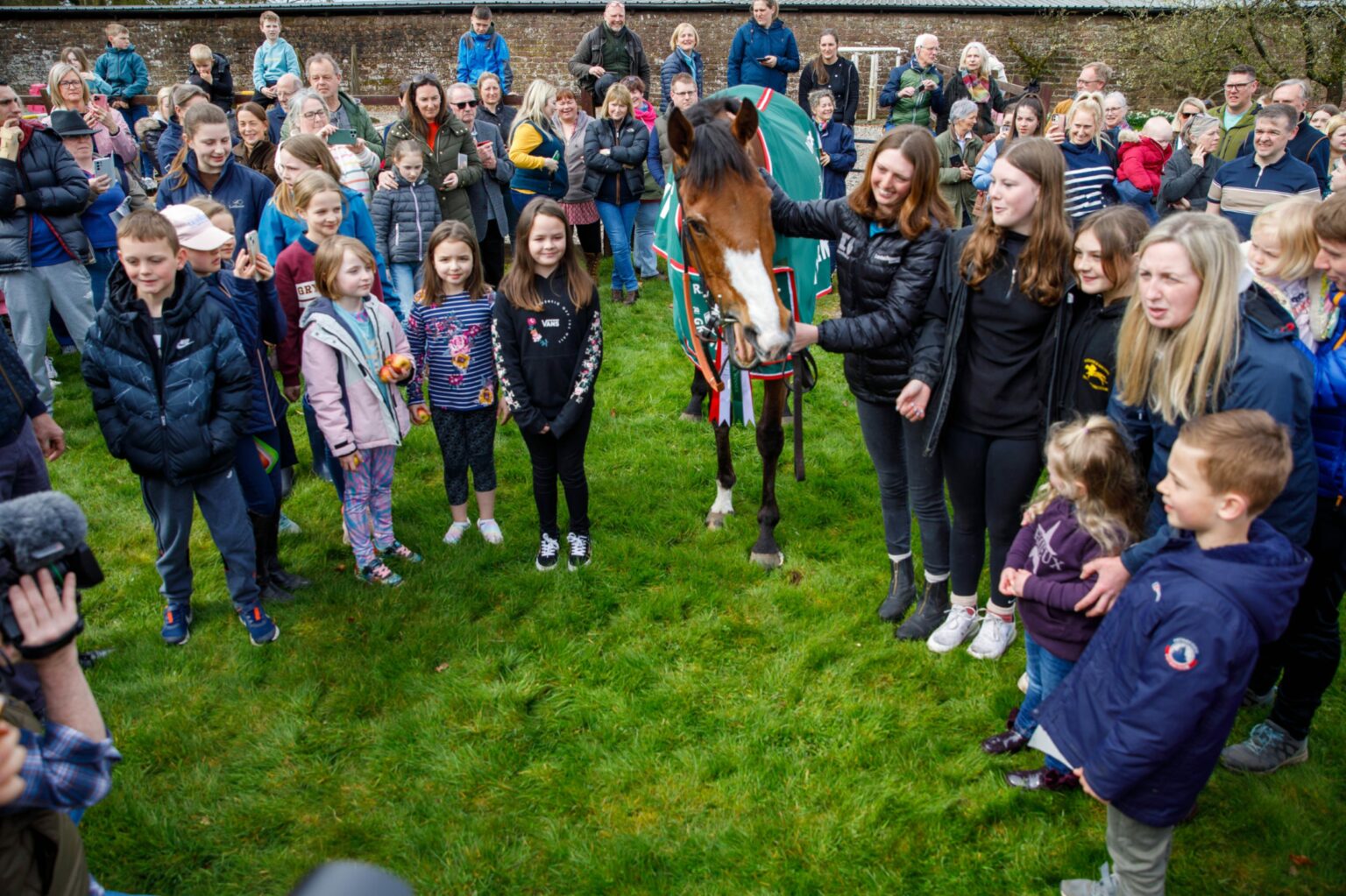 Pictures as Grand National winner Corach Rambler returns home