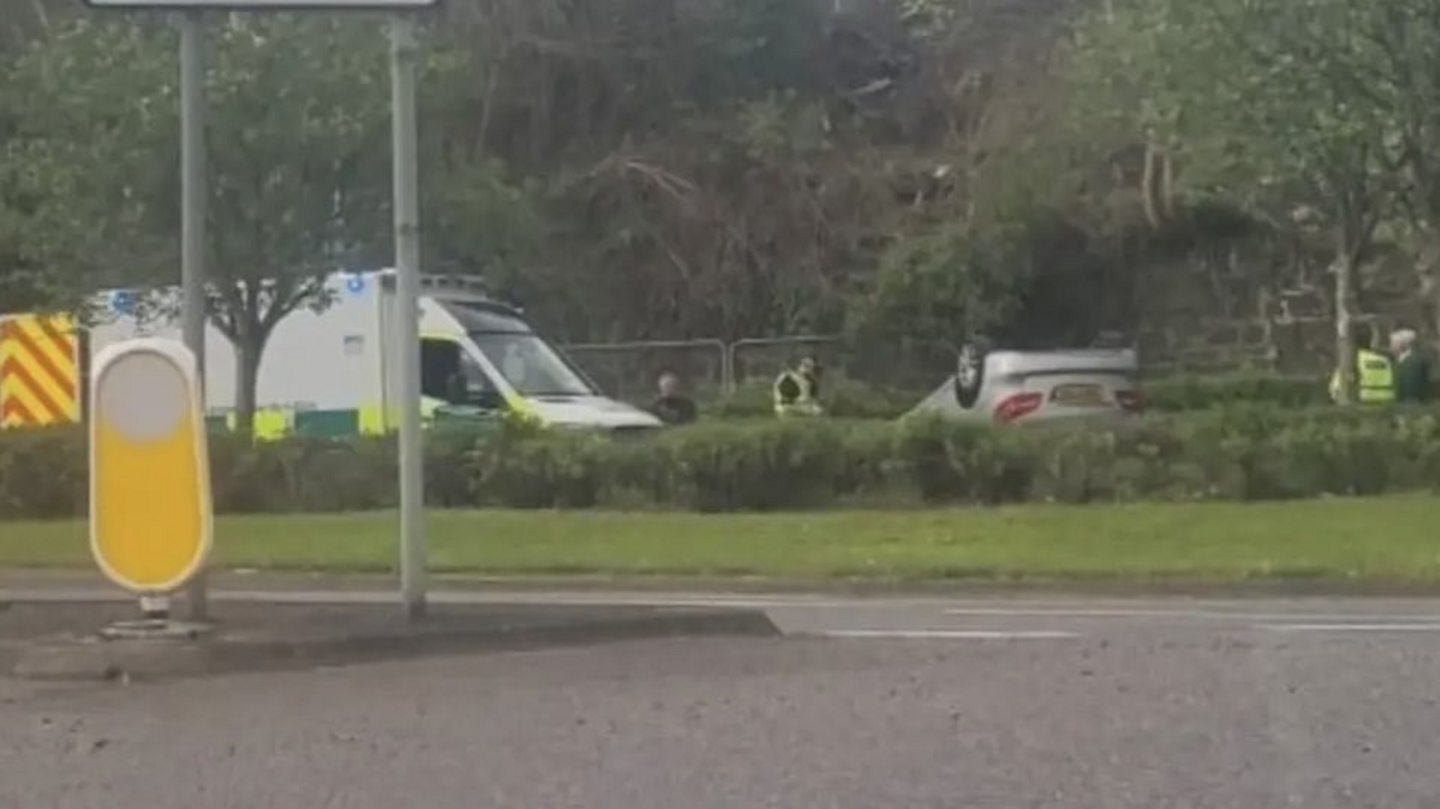 Car hits garage and crashes down 40ft bank in Inverkeithing