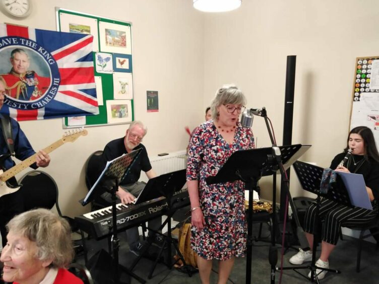 Retired teacher, 97, leads coronation celebrations at Kinross Centre