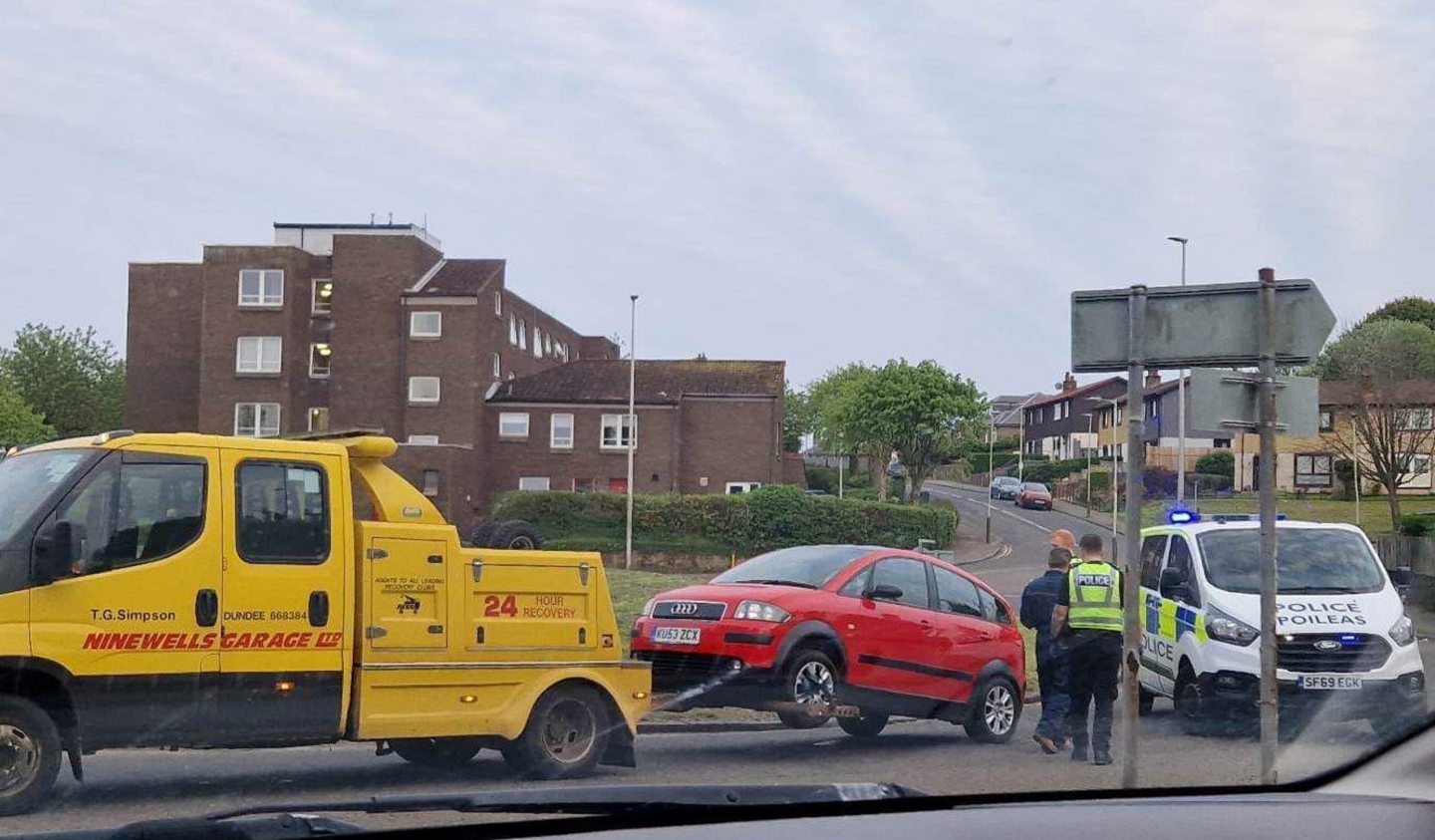 Police probe after stolen car crashed at busy Dundee roundabout - The ...
