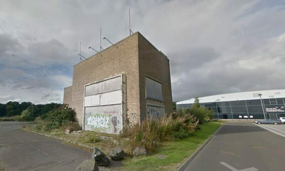 Police probe after fire at old NCR building in Dundee