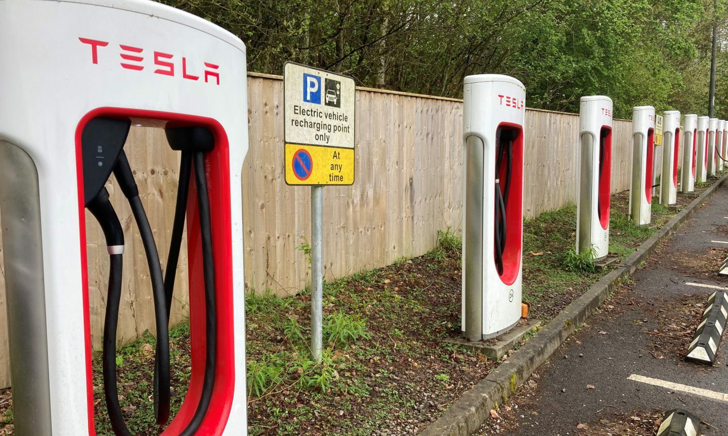 Tesla driver banned after swigging wine in charging bay in Perth