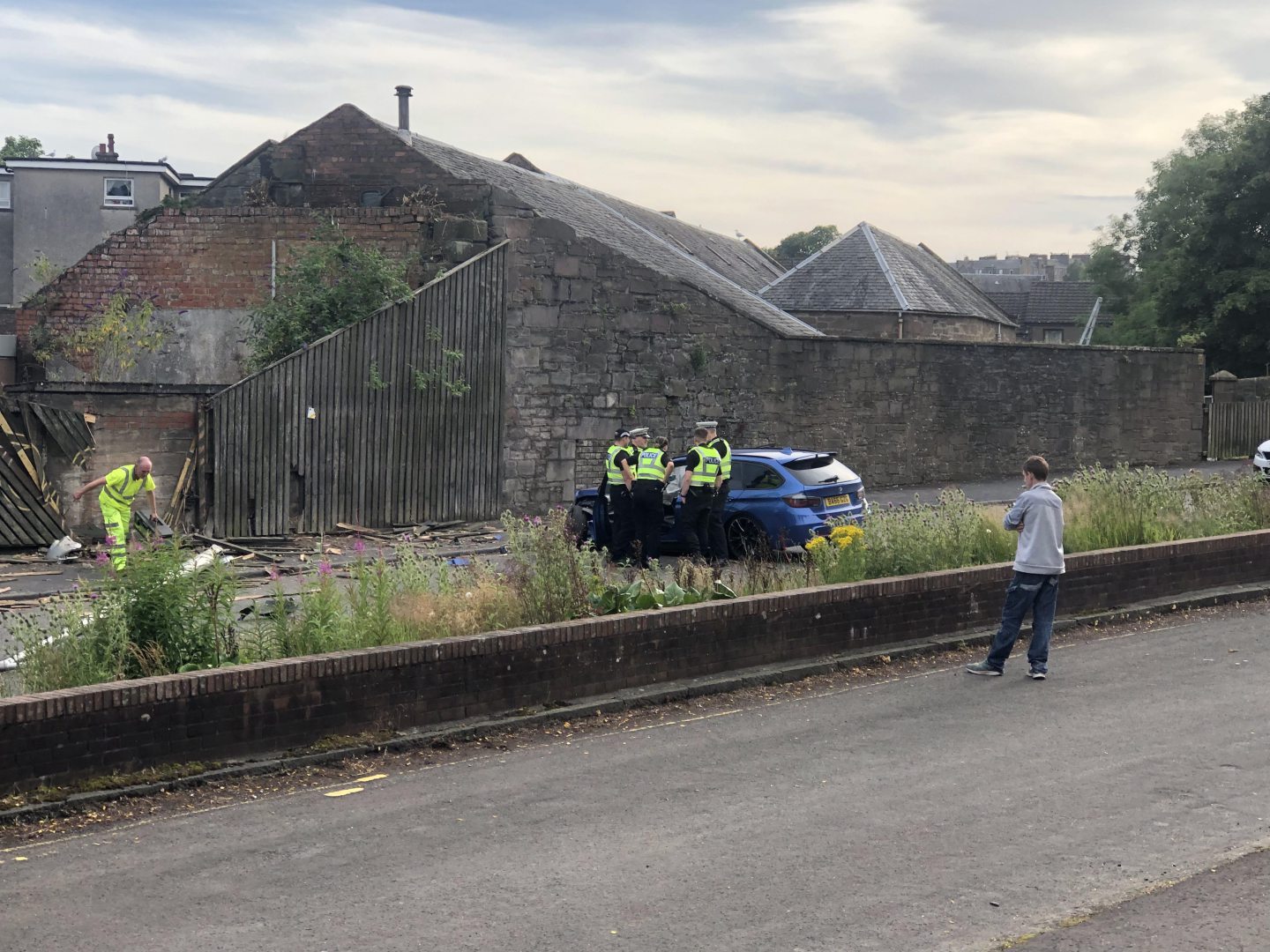 Youngster's near miss after Lochee Road car crash