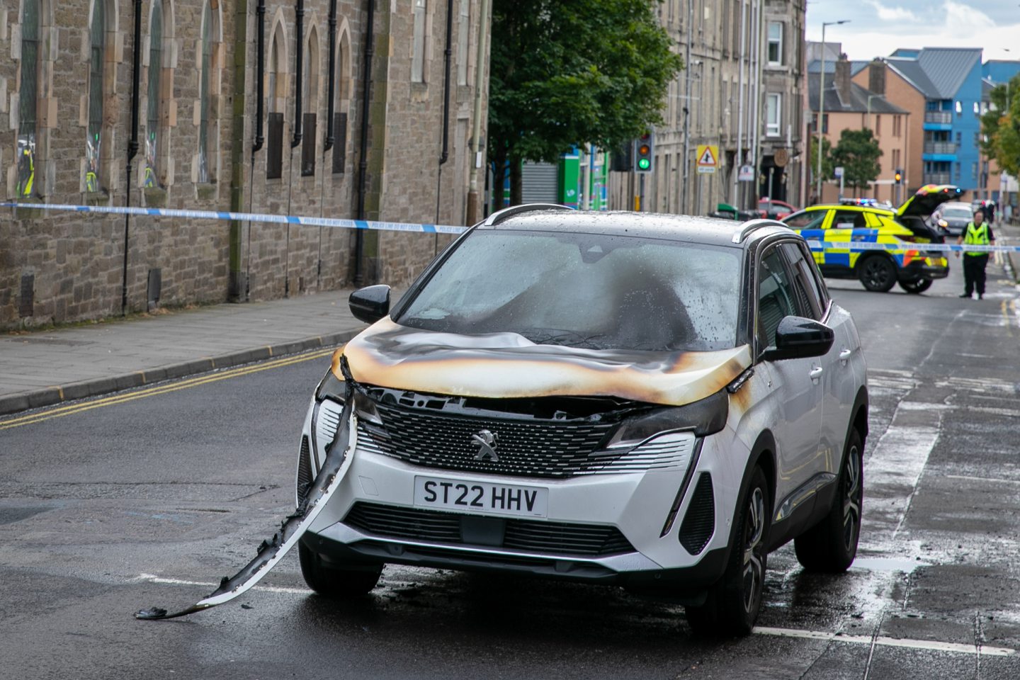 Emergency services called to car fire on busy Dundee street