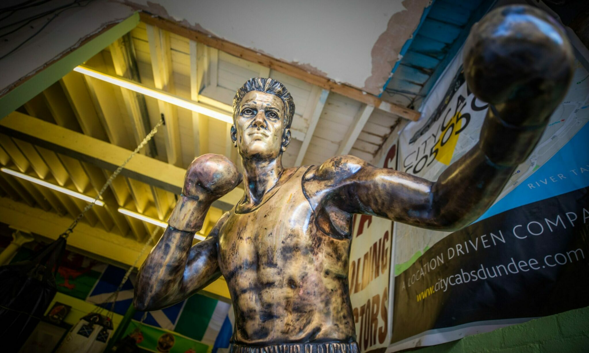 Dick McTaggart statue honouring Dundee boxing icon in new home