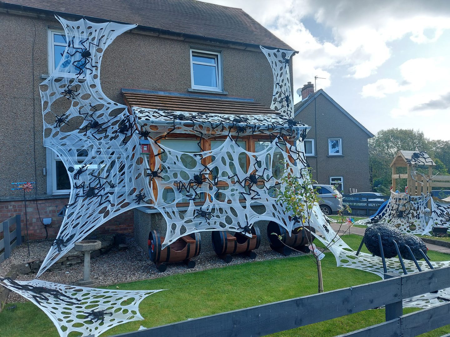 Brechin family cover house in Halloween spider's web