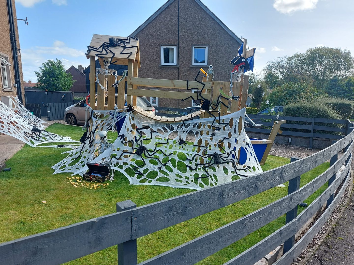 Brechin family cover house in Halloween spider's web