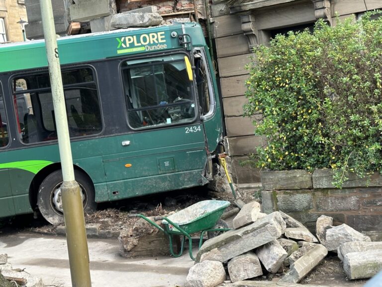 Xplore Dundee bus remains stuck in building three days after crash