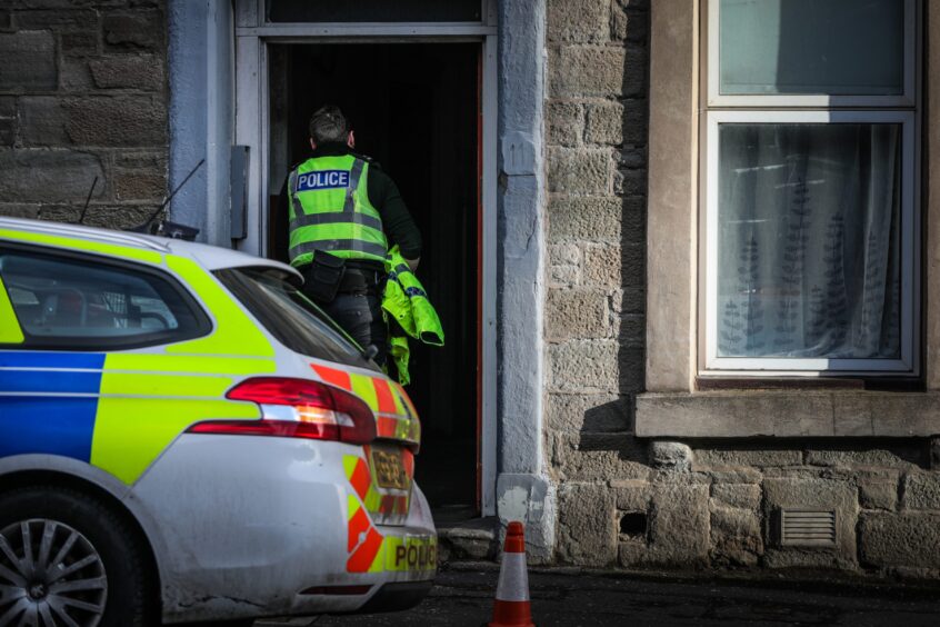 Ryan Munro death: Forensics officers back at Morgan Street flat