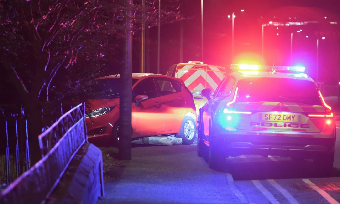 Man, 20, arrested after car crash into lamp-post in Perth