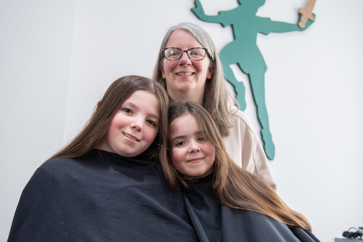 Kirriemuir sisters Zoe, 5, and Alix, 9, have hair cut for cancer charity