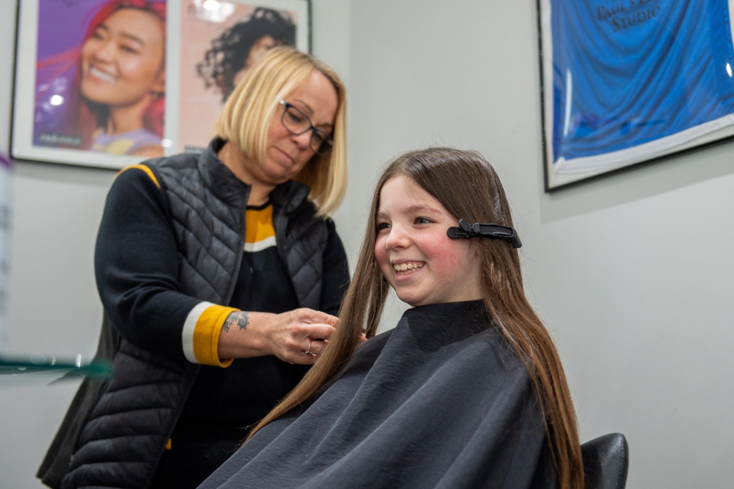 Kirriemuir sisters Zoe, 5, and Alix, 9, have hair cut for cancer charity