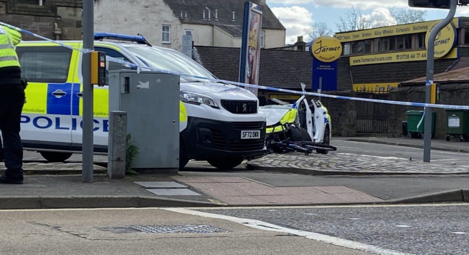 Perth city centre road sealed off after crash involving police car ...