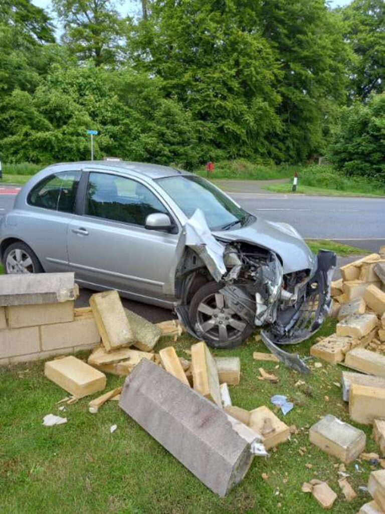 Pensioner's shock as car crashes into Dundee garden wall