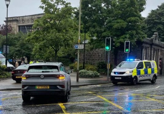 Police and ambulance crews at crash in County Place, Perth