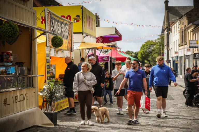 Best pictures as St Andrews Lammas Market rolls back into town