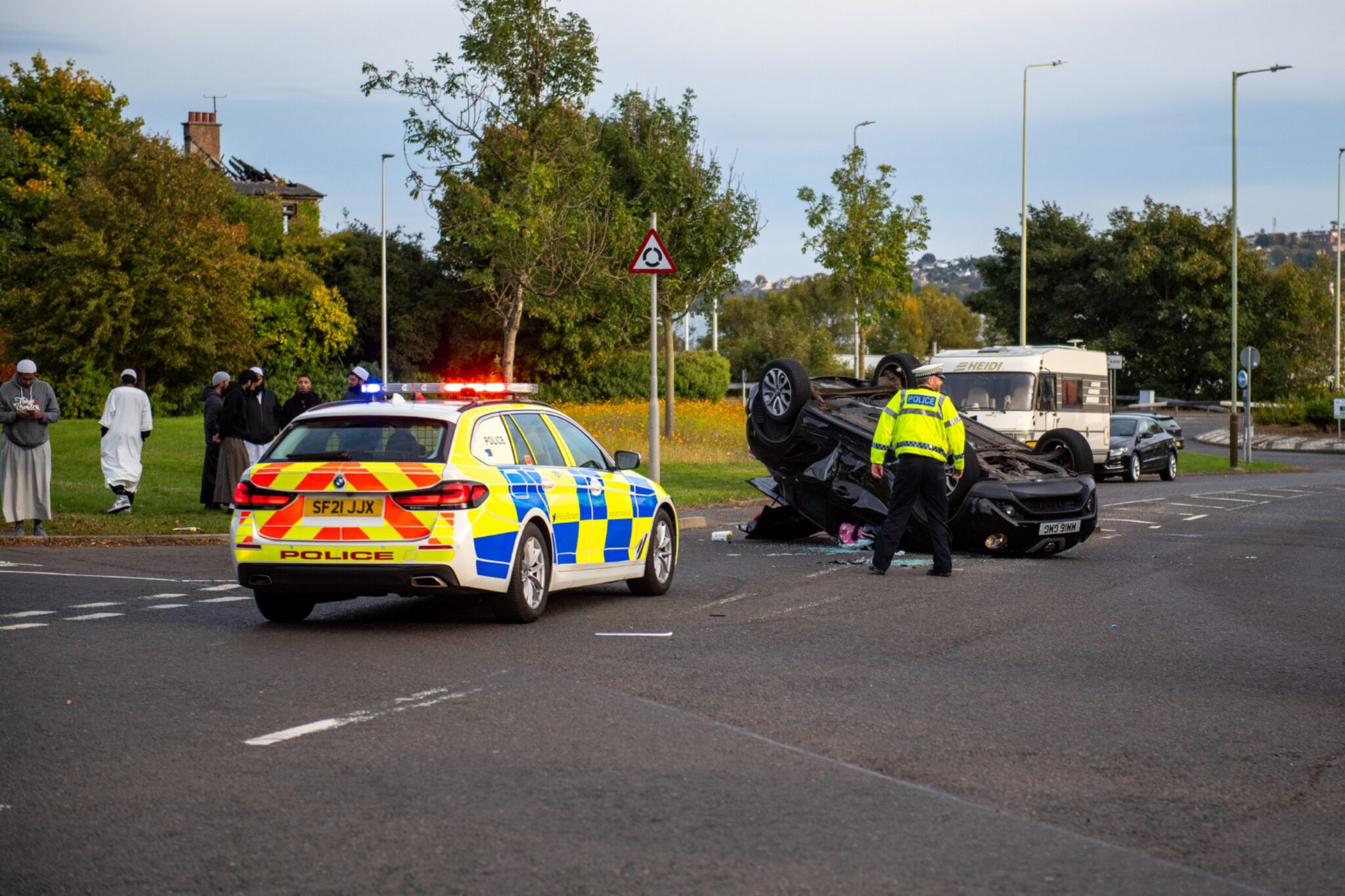 Strips of Craigie Road: Car flips onto roof after crash in Dundee