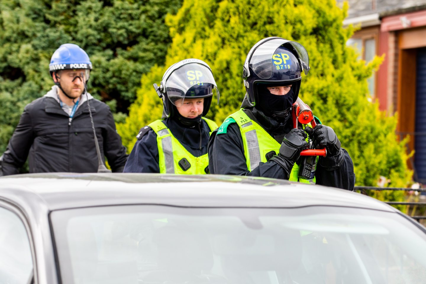 Police with dog in raid on home in Fairmuir area of Dundee